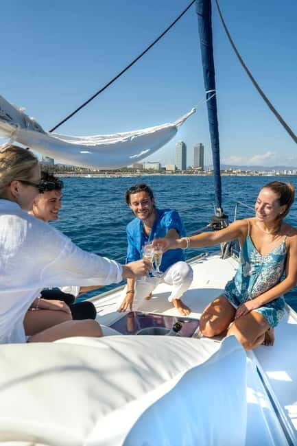 Barcelona: Sailing Tour with Young Local Captain & Drinks - The Highlights: Swim, Photos, and Sunset Views