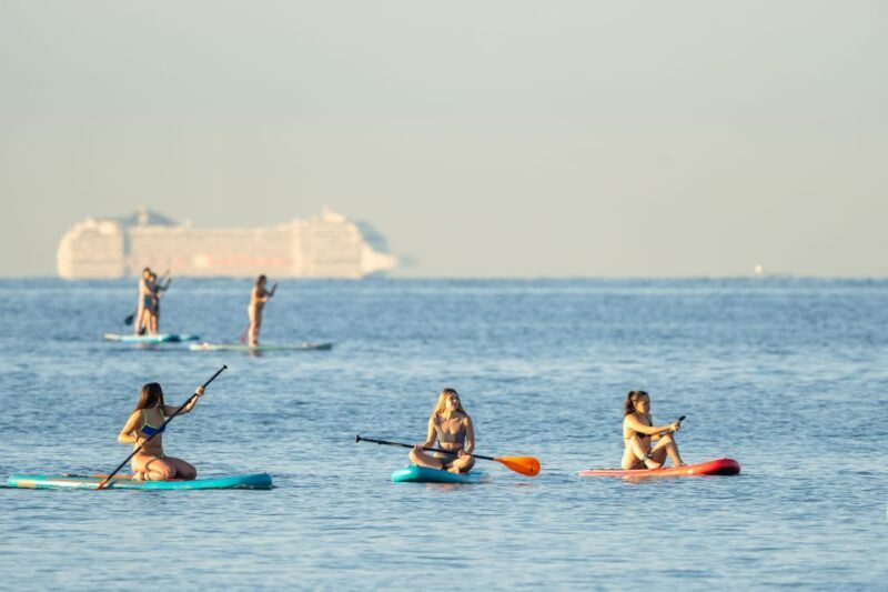 Barcelona: Sunset Paddleboarding Experience with 1 Beer - The Paddle Along Barceloneta’s Coast