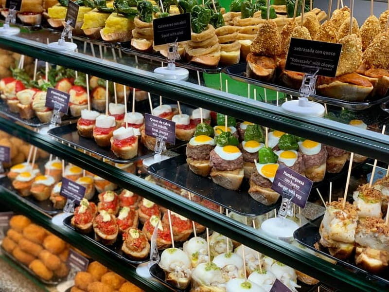 Barcelona: Tapas, Tipples, and Tales Food Tour - Deep Dive into the Itinerary