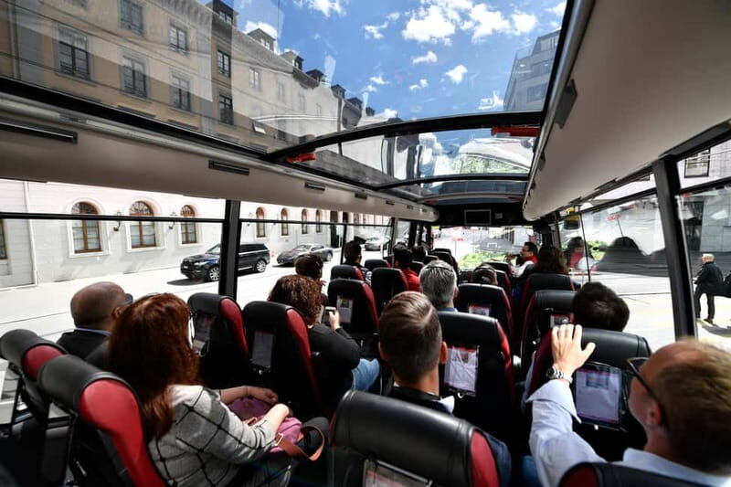 Basel: Sightseeing Bus Tour with Audio Guide - Key Points