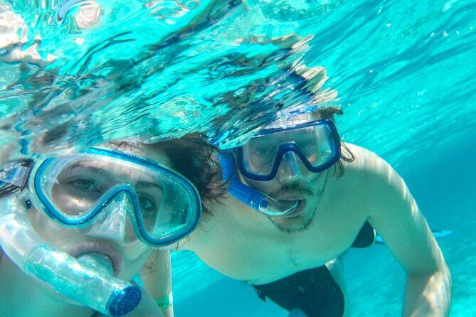 Bavaro Catamaran: Sail, Snorkel & Party with Drinks and Snacks - Authentic Experiences and Travel Tips