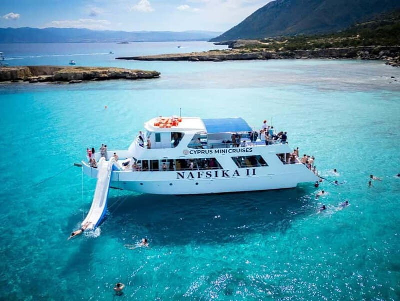 BBQ Boat: Nafsika II Sunset BBQ, Waterslide & Swimming Trip - Key Points