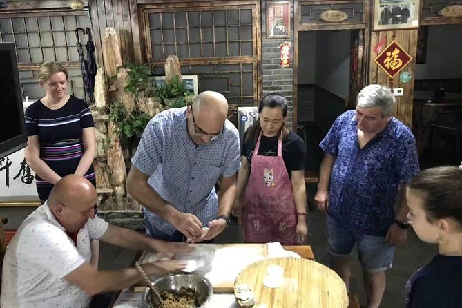 Beijing hutong rickshaw tour with homemade dumplings in family and Lama temple - Stop 2: Hutong Rickshaw Ride & Local Life