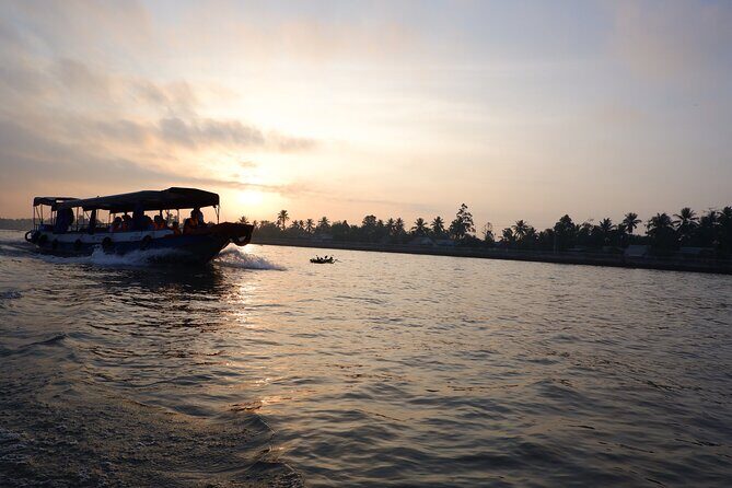 Boat tour visit 3 pagodas, Ancient house, see sunset on mekong river - Key Points