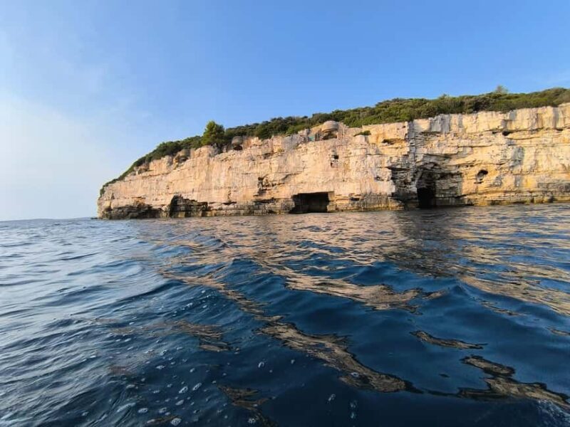 Boat Trip  Coastal Tour from Faana to Pula and snorkelling - The Marine and Land Experience: Snorkeling and Sightseeing Combined