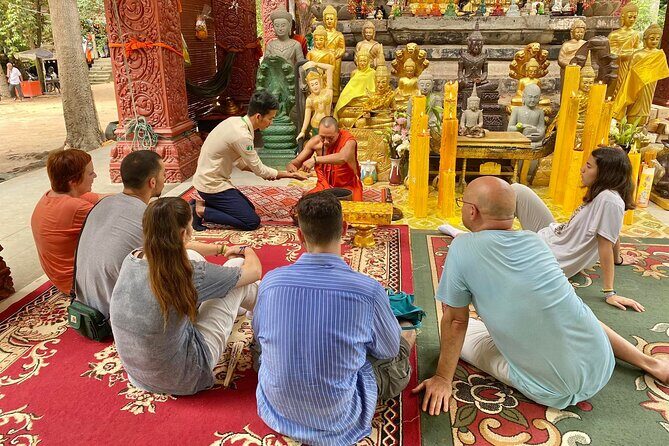 Buddhist Monastery with Monks Water Blessing - Key Points