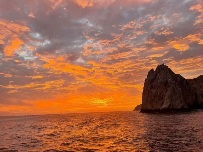 Cabo: Sunset Arch Yacht Tour - Dinner & Drinks up to 18 ppl - The Sum Up