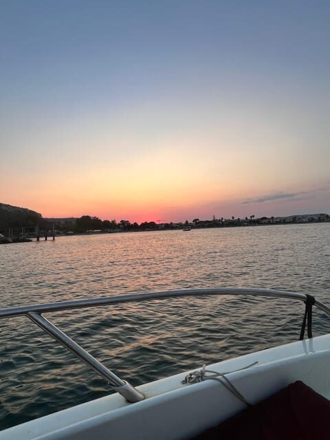 Cagliari: sunset aperiboat in the Angel's Gulf - Key Points