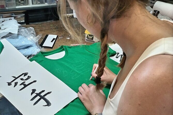 Calligraphy on T-shirt and lantern near Skytree Tokyo - What to Expect from the Calligraphy Experience