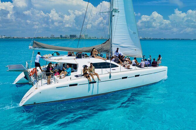 Cancún Catamaran to Isla Mujeres + Snorkel, Open Bar & Lunch - Key Points