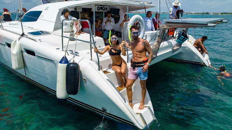 Cancún Catamaran to Isla Mujeres + Snorkel, Open Bar & Lunch - Setting Sail from Cancun