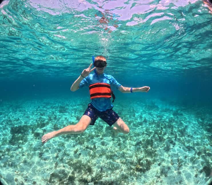 Cancún Catamaran to Isla Mujeres + Snorkel, Open Bar & Lunch - Relaxing on Playa Norte and Lunch
