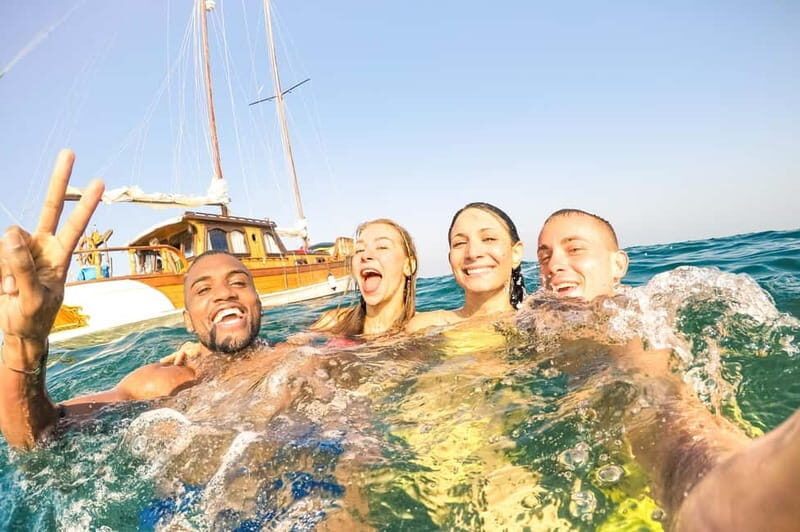 Capri: Boat tour Adventure Caves Swim Beaches & Island Visit - Key Points