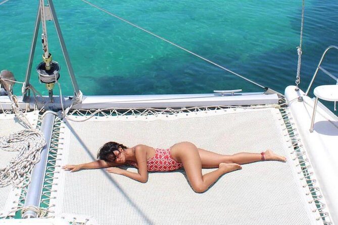 Catamaran adventure to Isla Mujeres with Snorkel,Buffet,Open Bar and Beach Club - What the Reviews Say