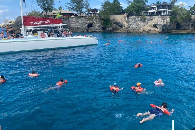 Catamaran Cruise and Bamboo Rafting Limestone Massage Experence - The Tour Breakdown: What to Expect