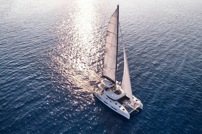 Catamaran Cruise to Dia Island with Meal and Water Activities - Return Sailing and Final Swim