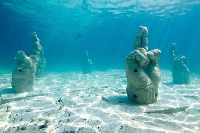 Catamaran Group Sightseeing, Snorkeling Tour Isla Mujeres - Itinerary Breakdown: What to Expect