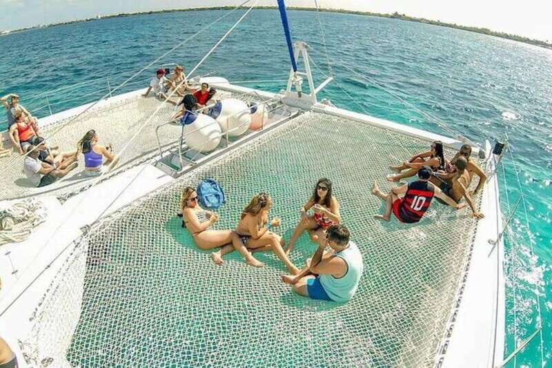Catamaran party Isla Mujeres with drinks & lunch - Oasis at Playa Norte Beach Club