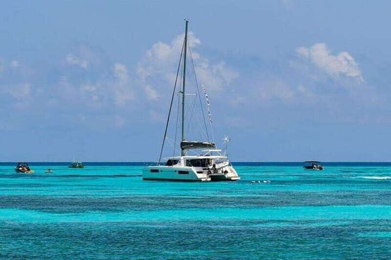 Catamaran party Isla Mujeres with drinks & lunch - Authentic Staff and Scenic Highlights