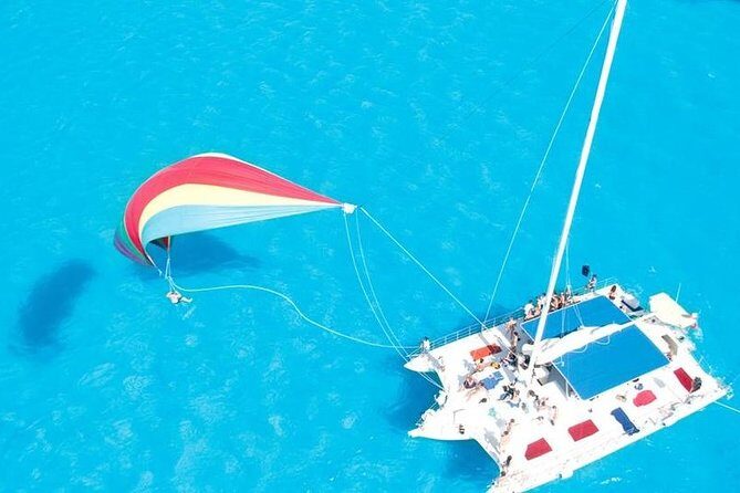 Catamaran Sailing to Isla Mujeres with Snorkeling, Lunch & Open Bar included - The Experience in Detail: Pros and Cons