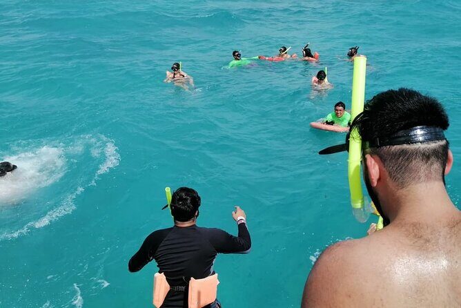 Catamaran to Isla Mujeres at sunset pick up Cancun - Authentic Traveler Perspectives