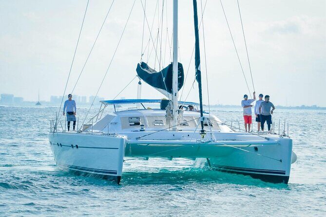 Catamaran to Isla Mujeres  Kids Go Free! (Only Pay Dock Fee) - The Return Journey: Party Onboard
