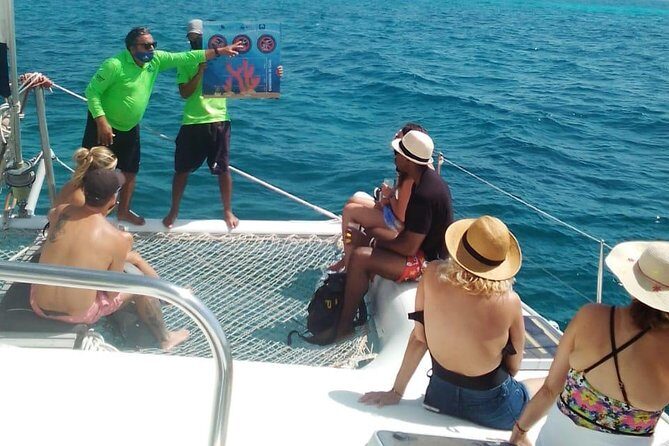 Catamaran to Isla Mujeres, Open bar, buffet, Beach Club Included - Summary: Who Should Consider This Tour