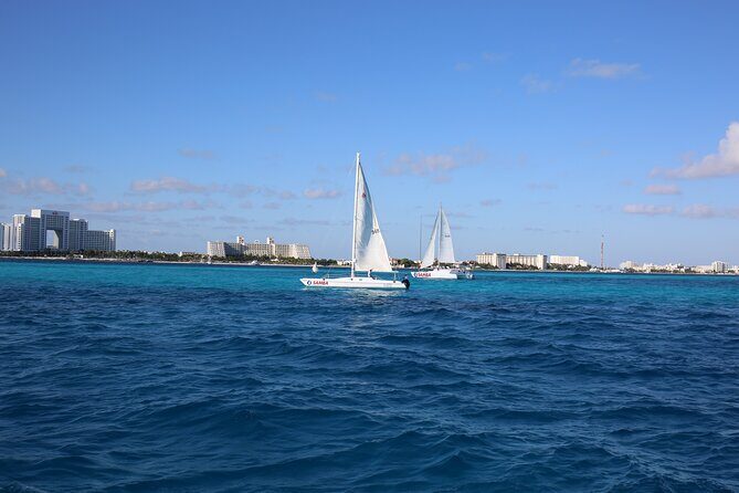 Catamaran to Isla Mujeres Snorkeling, Beach Club and Lunch Tour - The Bottom Line
