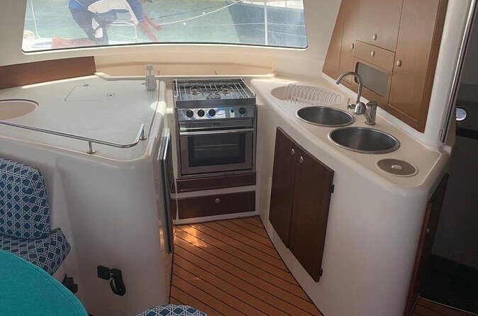 Catamaran Tour to Isla Mujeres Snorkeling with Buffet and Open Bar - Practical Details and What to Expect