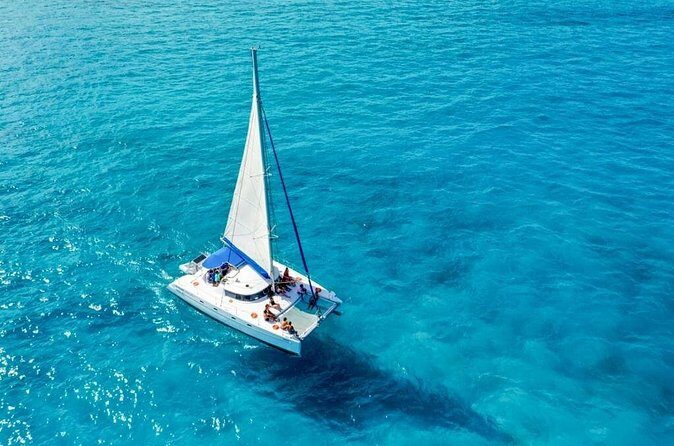 Catamaran Tour to Isla Mujeres Snorkeling with Buffet and Open Bar - The Sum Up
