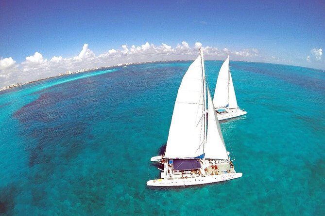 Catamaran tour to Isla Mujeres with snorkeling, open bar - Key Points