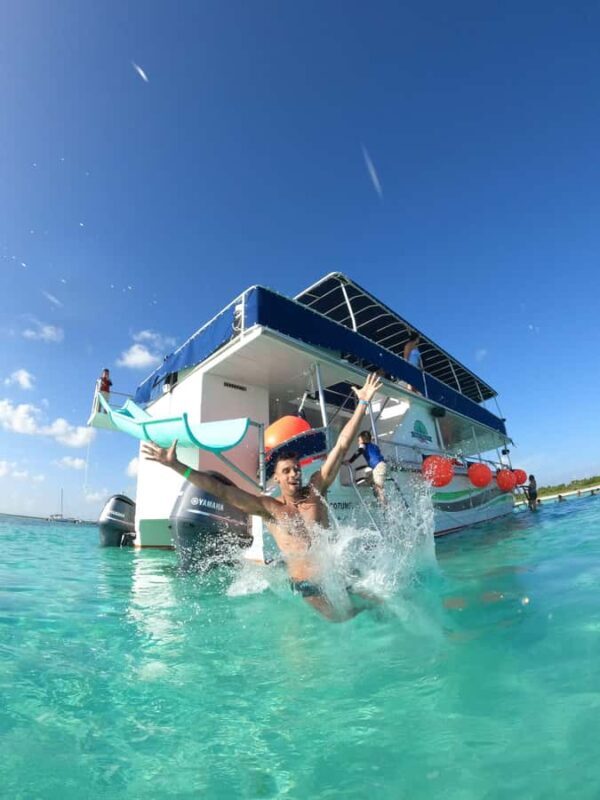 Catamaran with a slide in Cozumel  El Cielo, Cielito, and Palancar Reef - Discovering Cozumel’s Underwater and Above-Water Delights