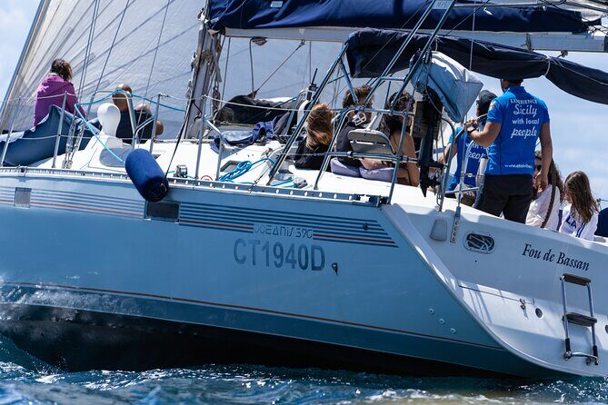 Catania: Sail Cyclops Coast by Boat and Enjoy a Sicilian Aperitif - The Sum Up