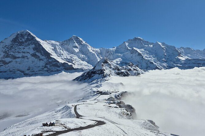 Cheese and chocolate on mountain summit - The Practicalities: Transportation, Duration, and Cost