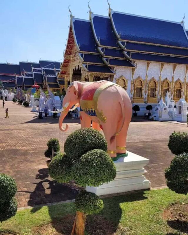 Chiang Mai: Sticky Waterfall and Blue Temple Tour - Exploring the Chiang Mai Waterfall: Climbing the Limestone Wonder