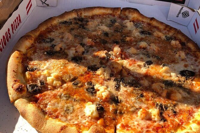 Christmas Cove and Pizza Pi Happy Hour Sail Tour - Key Points