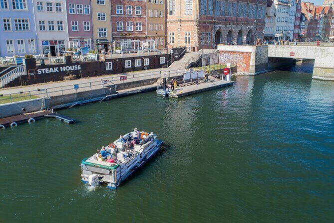 Cruises on the Motlawa River by a luxury catamaran - Gdask from the water side - A Scenic Flotilla of Gdansk’s Waterways