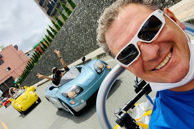 Cute & Fun E-Car tour following guide around Lake Kawaguchiko - The Sum Up