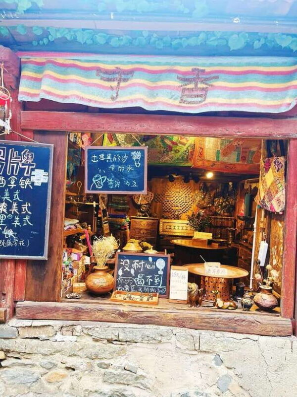 Dali: Xizhou Ancient Town and Dali Ancient City Tour - Climbing Wuhua Tower for Panoramic Views