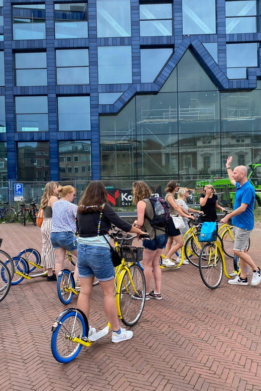 Delft - Step/scootertour in and around the city - Market Square, Old Church, and the Leaning Tower