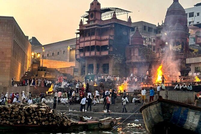 Delhi to Varanasi: Tour to the Sacred Ganga Aarti Ceremony - Reflecting at Manikarnika Ghat