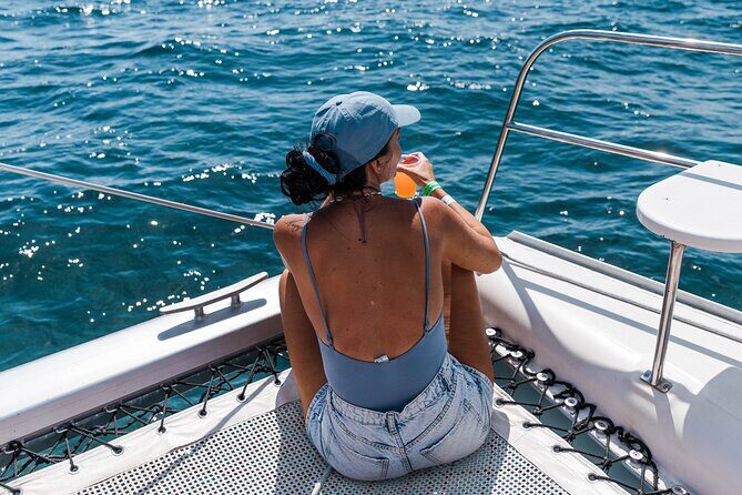 Deluxe Catamaran Tour to Isla Mujeres, Drinks, Snorkeling, Buffet - The Sum Up