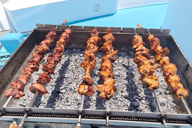 Demetris Chara Boat/Blue Lagoon boat trips with BBQ and SLIDE - The Sum Up