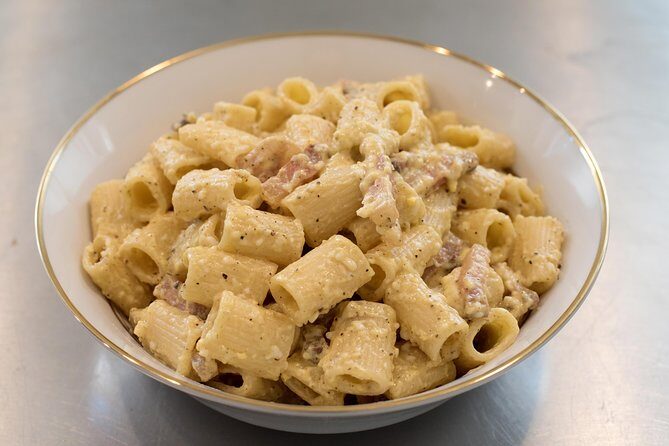 Dining experience at a local's home in Civitavecchia with show cooking - Key Points