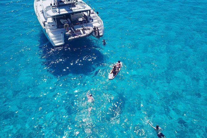 Discover Cala Bassa and Cala Comte on board a catamaran - An Introduction to the Ibiza Catamaran Experience