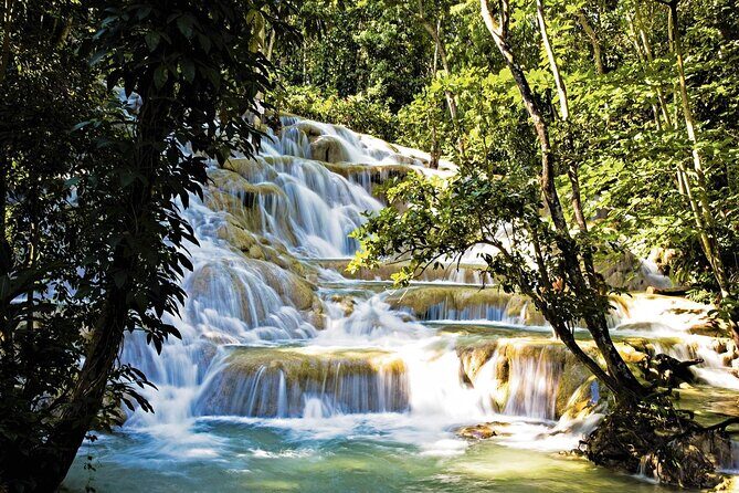 Dunns River Falls and Blue Hole Tour From Montego Bay - Key Points