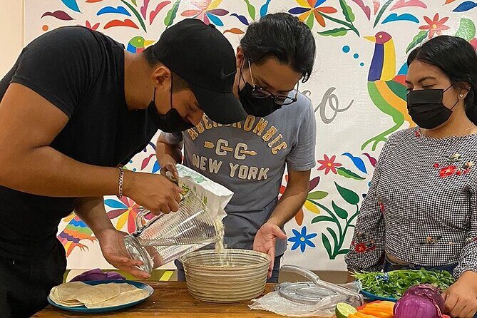 Elaboration of tortillas by hand following the Mexican tradition - A Deep Dive into the Tortilla-Making Tour in Cancun