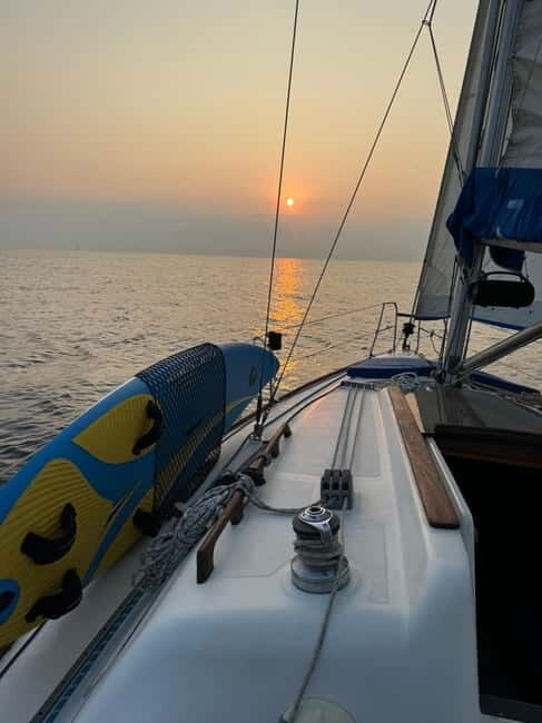 Enjoy the sunrise in Barcelona from a sailboat with drinks & snacks - Key Points