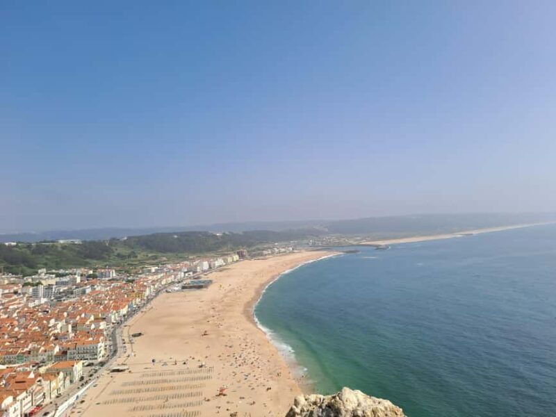 Ericeira: Surf Guide Tour to Nazaré with Transportation - The Transportation and Group Dynamic