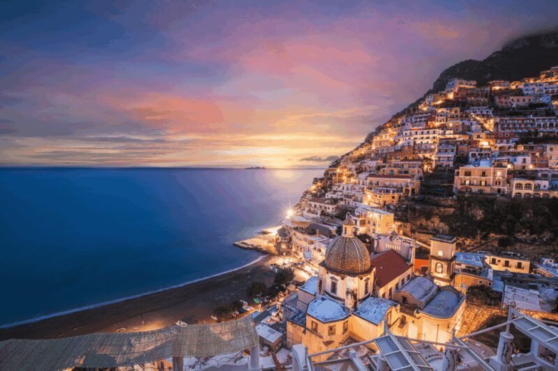 Evening drive along the Amalfi Coast and seaside dinner. - Returning to Naples